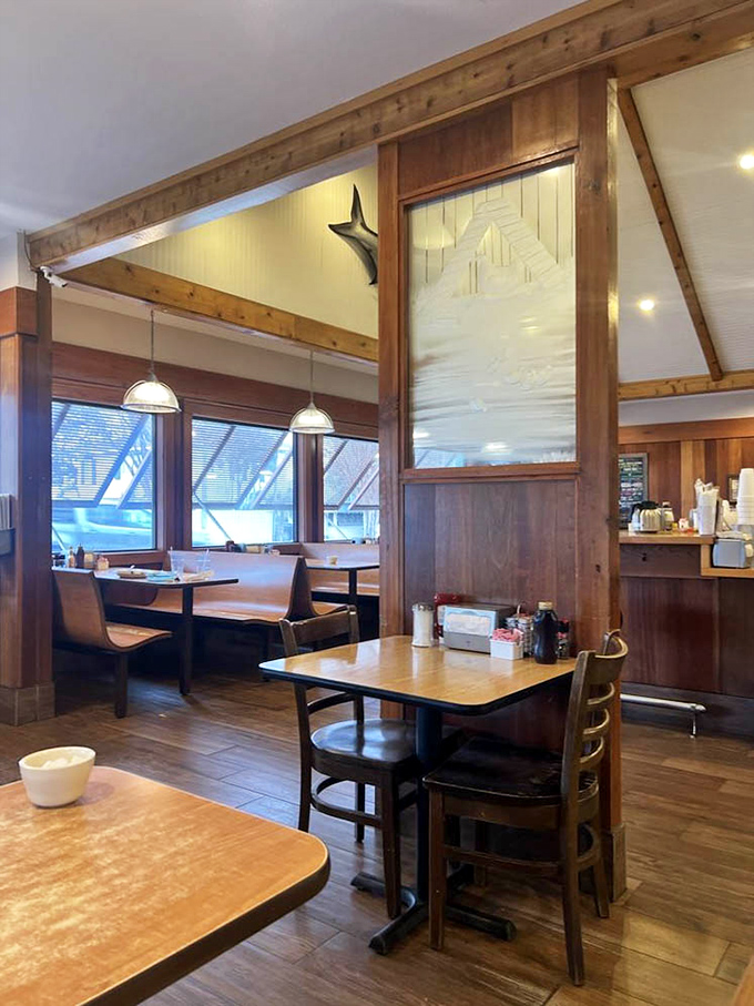Warm wood paneling and cozy booths create that perfect "stay awhile" vibe. The kind of place where calories don't count and coffee refills are practically mandatory.
