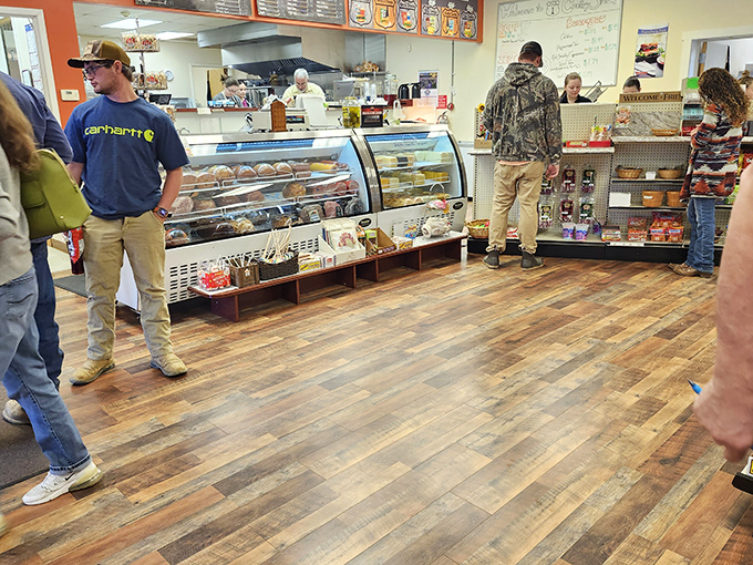 Inside, the warm wooden floors and gleaming display cases promise authentic delights that chain restaurants can only dream about.