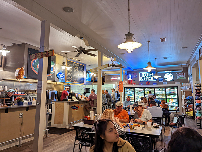 Inside, the buzzing heart of Indian Pass Raw Bar feels like a neighborhood block party where everyone's invited and the seafood is the guest of honor.