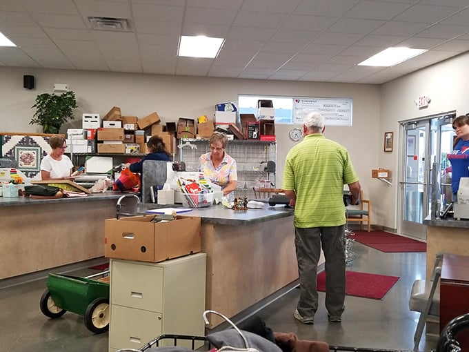 Inside, the bright, organized interior defies thrift store stereotypes with its department store-like layout and clearly marked sections.