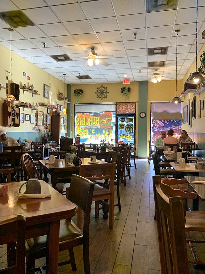 Yellow walls adorned with knick-knacks create that "grandma's kitchen got an upgrade" vibe that makes you instantly feel at home.