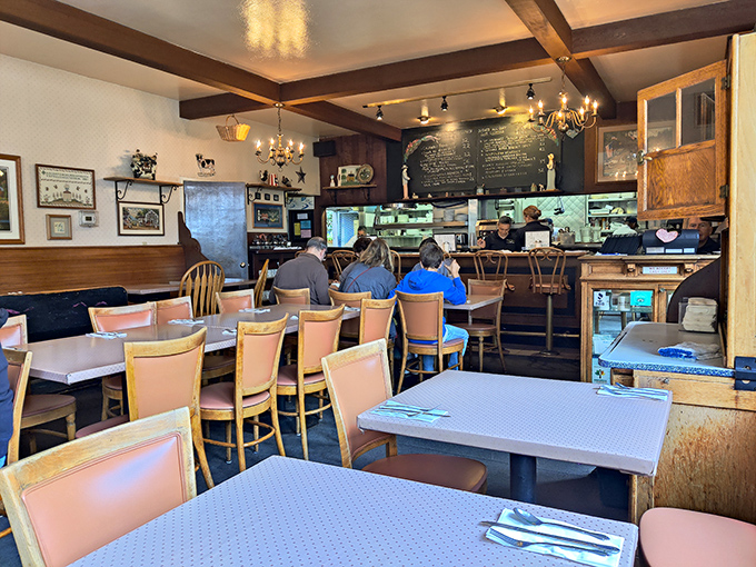 The dining room where breakfast dreams come true. Those pink chairs aren't just seating&mdash;they're front-row tickets to the breakfast theater.
