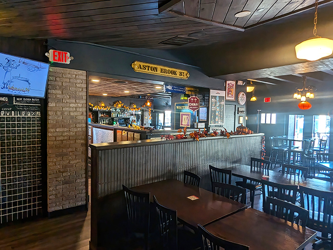 Dark wood and vintage signs create the kind of atmosphere that makes you want to settle in for hours.