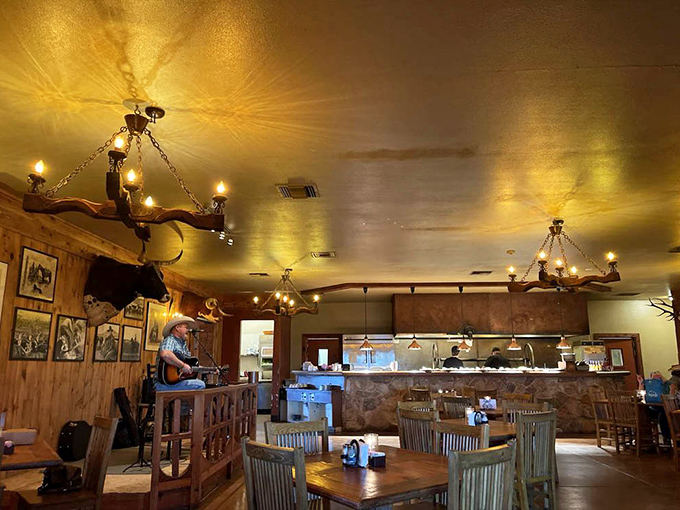 Step inside to find wagon wheel chandeliers casting a warm glow over wooden interiors that whisper tales of the Old West.