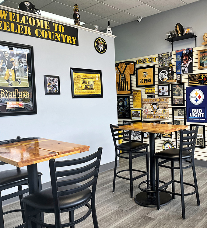 Welcome to Steelers Country! The dining area doubles as a shrine to Pittsburgh sports, making even a Ravens fan consider temporary conversion for pizza this good.