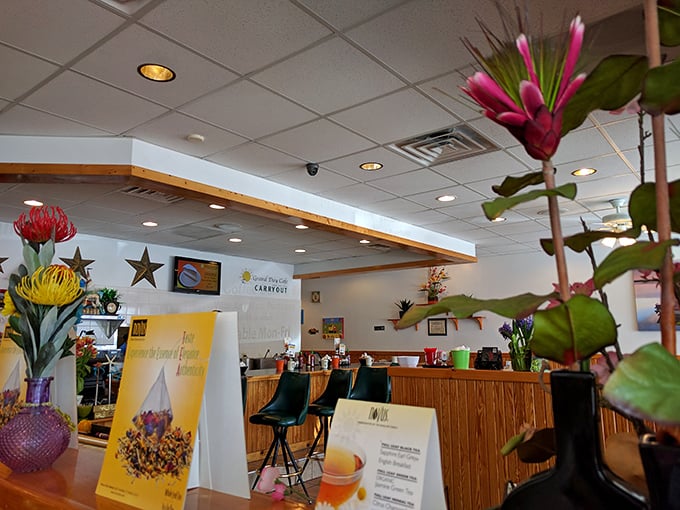 Colorful flowers and warm wooden accents create that perfect "come as you are" atmosphere where both sweatpants and business suits feel equally at home.