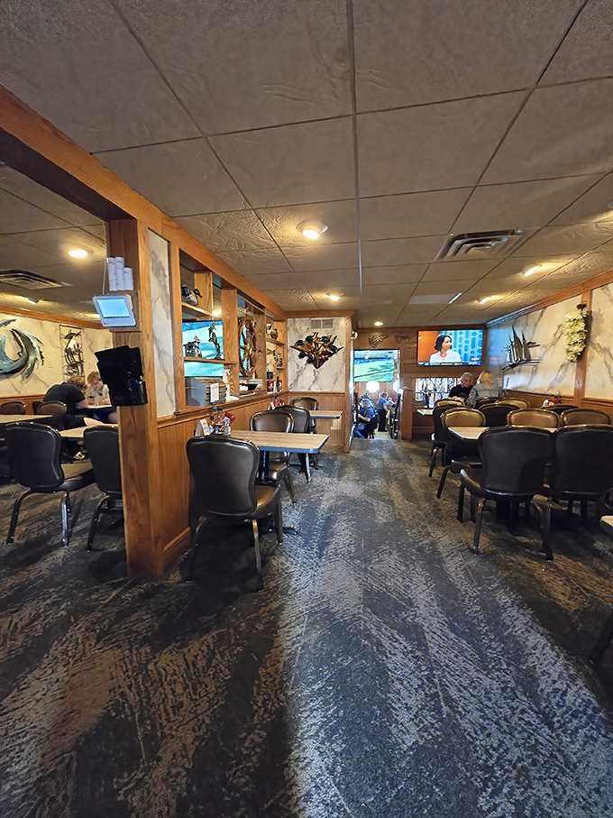 Wood paneling, comfortable seating, and nautical decor create that perfect "I've discovered something special" feeling that makes regulars out of first-timers.