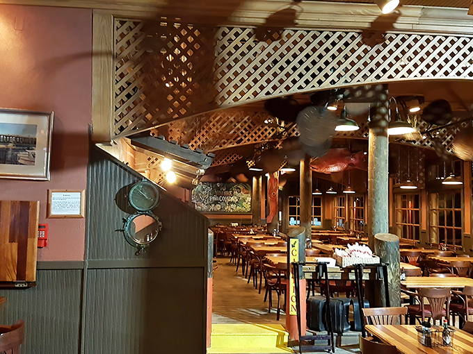 Nautical charm meets comfort inside The Crab Trap, where wooden beams and fishing memorabilia create the perfect backdrop for seafood feasting.