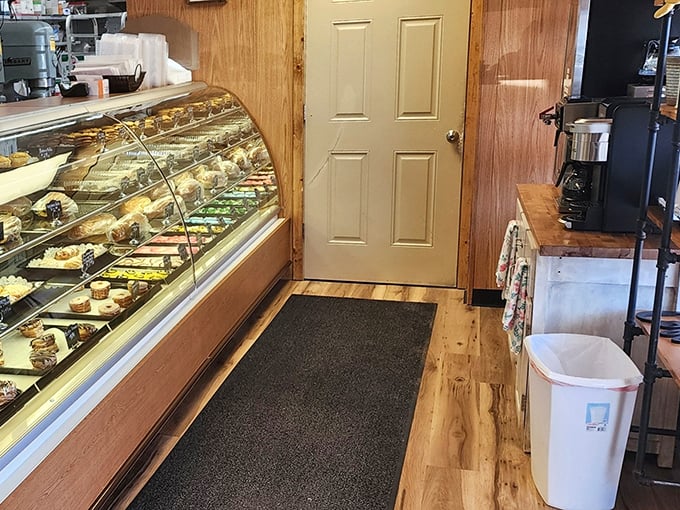 Step inside this cozy haven where wood paneling meets pastry perfection, and every surface whispers promises of homemade goodness.