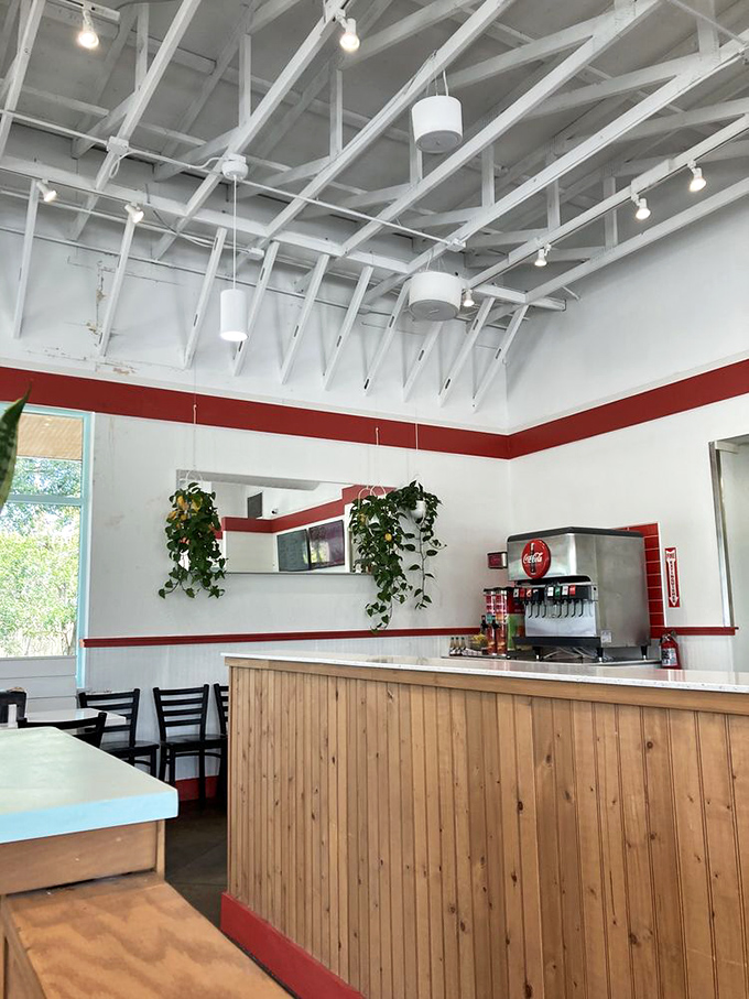 Exposed beams, clean lines, and that signature red stripe&mdash;Hugh-Baby's interior feels like a modern diner where comfort food gets the respect it deserves.