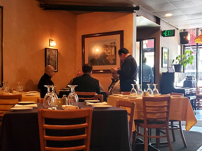 Inside, warm terracotta walls and attentive service create the perfect backdrop for conversations that flow as smoothly as the wine.