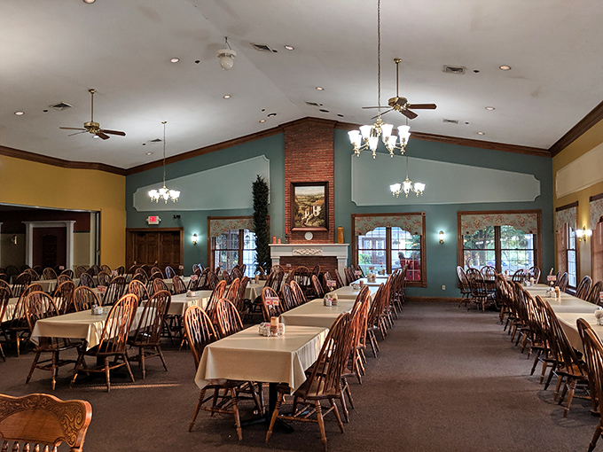 Step inside to a dining room where time slows down&mdash;Windsor chairs, warm wood tones, and a central fireplace create the perfect backdrop for conversations that linger as long as the meals. 