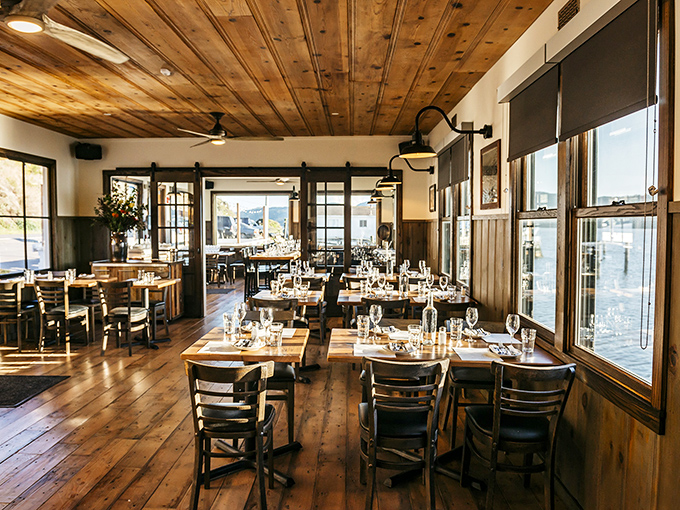 Warm wooden beams and bay views create the perfect backdrop for seafood feasting. It's like dining in a stylish fisherman's cabin.