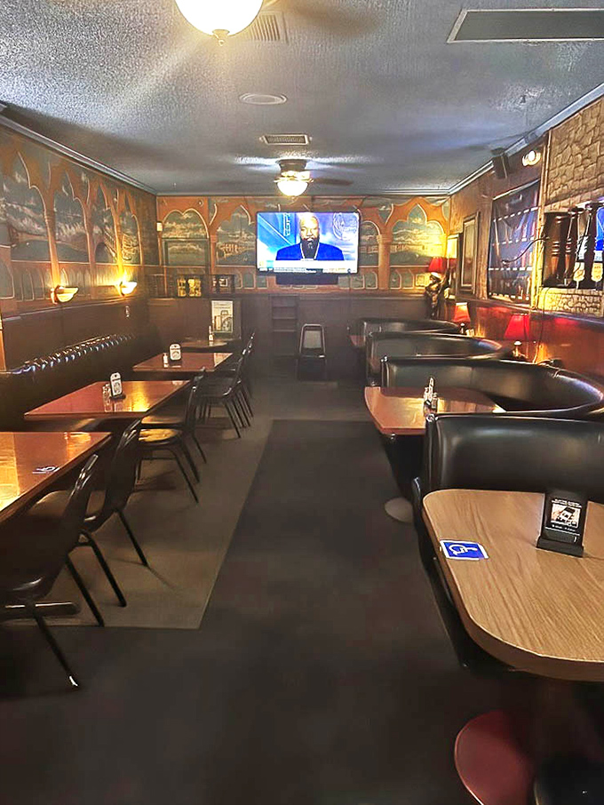 Step inside and time stands still – dark wood, Venetian murals, and booths designed for conversations that last longer than your cocktail.