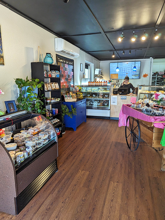 Step inside and enter the danger zone for any diet. The blue cabinetry and wooden floors create the perfect backdrop for your inevitable moment of pastry weakness.