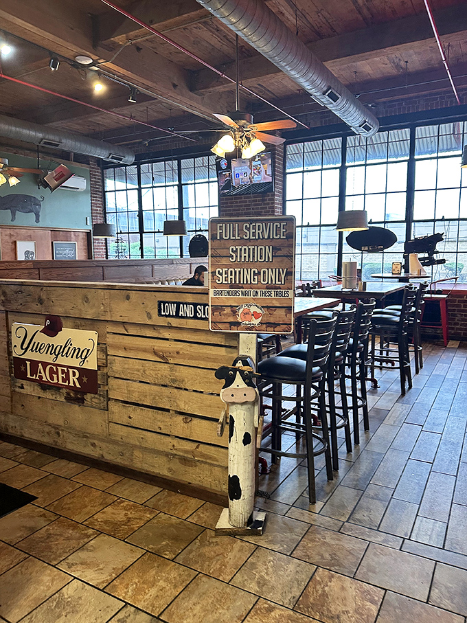 Industrial chic meets neighborhood comfort, where exposed beams watch over your barbecue journey with architectural approval.