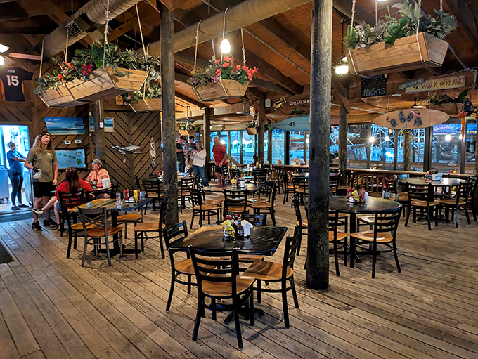 Wooden beams, hanging plants, and that unmistakable Florida light filtering through windows—this isn't just a restaurant, it's a postcard you can walk into.