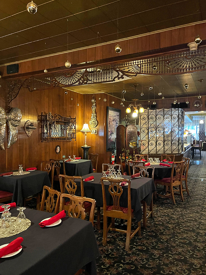 Step inside and you're transported to another era &ndash; wood paneling, ornate ironwork, and twinkling lights create the perfect backdrop for Italian-American classics.