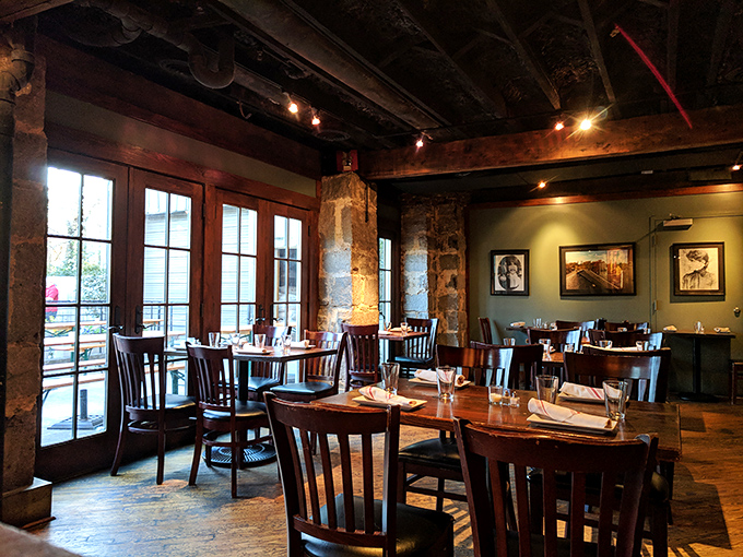 Stone walls and wooden beams create the perfect backdrop for culinary magic, like dining in a medieval castle that happens to serve incredible beer.