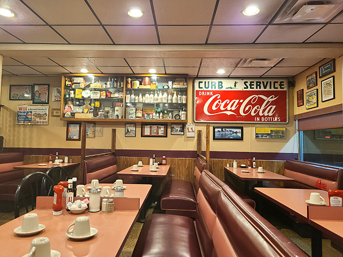 Step inside and time travel to the golden age of diners&mdash;burgundy vinyl booths, wood paneling, and vintage Coca-Cola signs create the perfect backdrop for breakfast epiphanies.