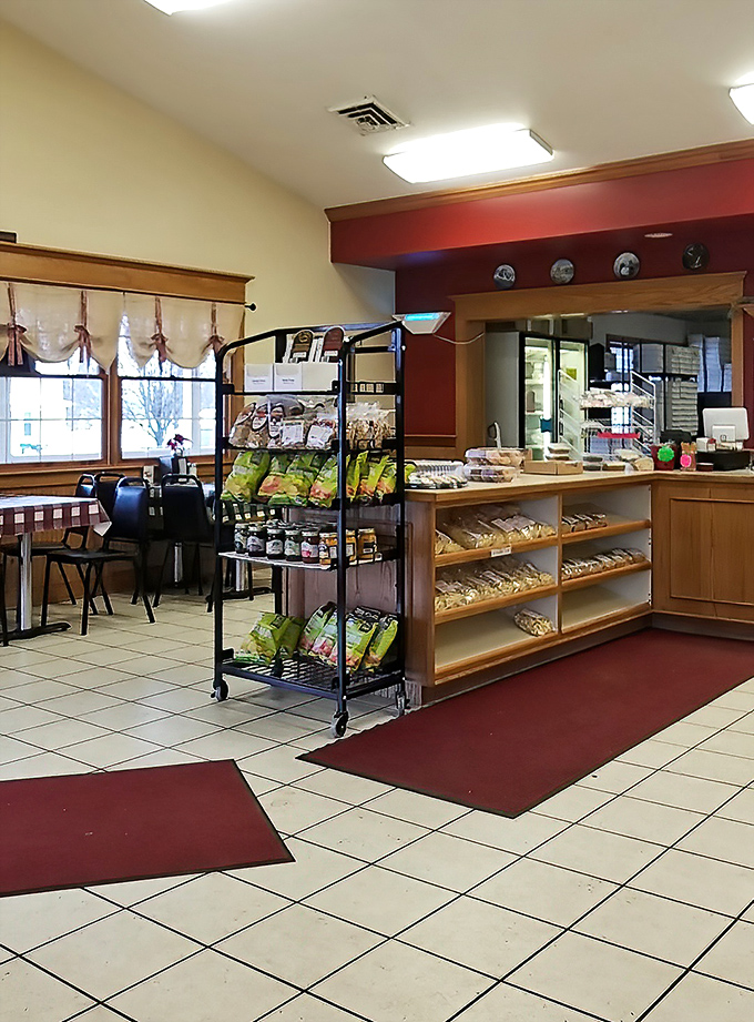 Simple elegance defines the interior, where wooden shelves and display cases let the baked goods be the true stars of the show.