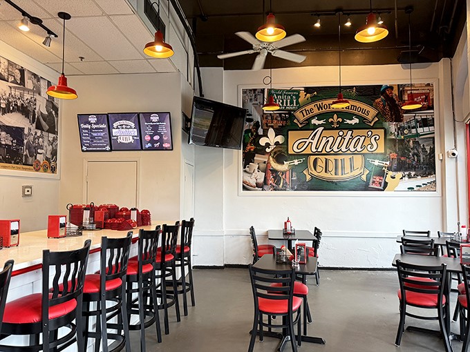 Classic diner aesthetics meet New Orleans charm with those signature red seats and pendant lights creating the perfect backdrop for breakfast epiphanies.