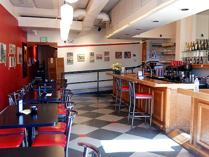 Inside, the classic diner-meets-bistro vibe with its signature checkered floor creates an atmosphere where comfort meets casual elegance.