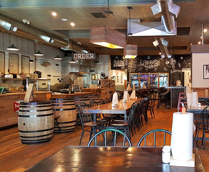 Inside, wine barrels meet industrial chic in a space that says, "Yes, we're serious about barbecue, but we're not above having fun with it."