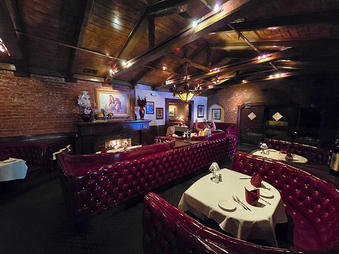 Red leather booths cradle diners beneath exposed wooden beams, creating the perfect atmosphere for important decisions&mdash;like medium-rare or rare.