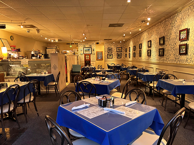 Blue tablecloths and vintage-inspired wallpaper create that perfect diner atmosphere&mdash;somewhere between your grandmother's dining room and breakfast heaven.