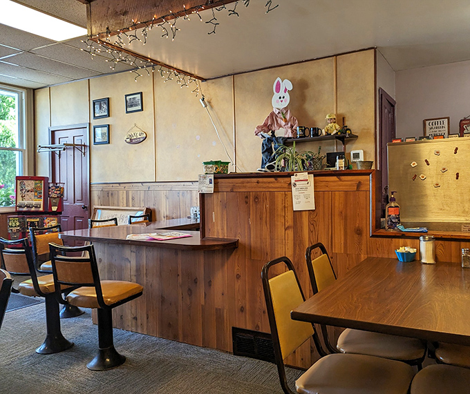 Step into comfort food heaven where wood paneling meets genuine hospitality in perfect harmony.