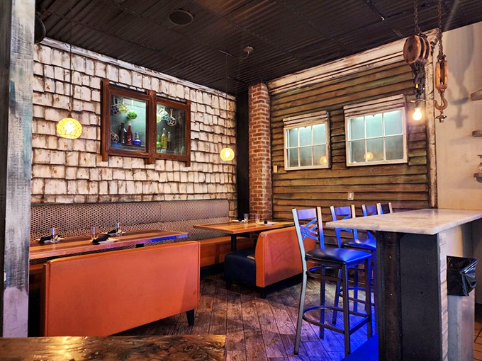 Step inside and you're transported to a cozy fishing cabin that somehow got a degree in interior design. Those orange booths practically beg you to settle in.
