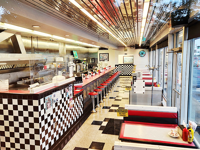 Classic Americana in every detail&mdash;red vinyl stools, checkered tiles, and a counter where strangers become friends over steaming mugs of coffee.