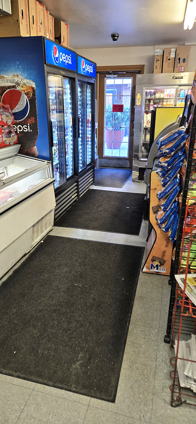 Inside, it's all business &ndash; refrigerated cases and snack racks line the walls in this temple of sandwich craftsmanship.