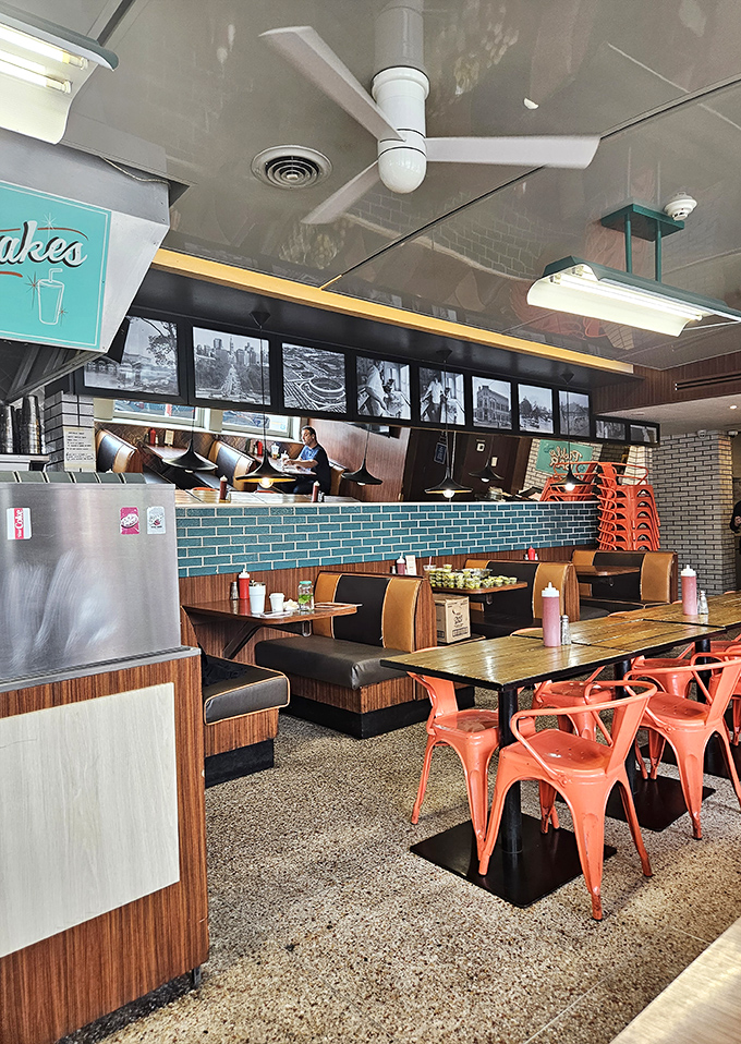 Step inside and time-travel to a bygone era where coral chairs meet wood-paneled booths, creating the perfect backdrop for Philadelphia's evolving food traditions.