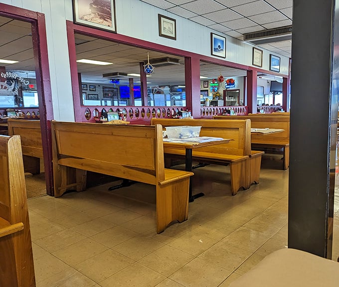 Wooden booths worn smooth by decades of crab feasts tell stories of countless memorable meals. This isn't fancy&mdash;it's authentic Maryland dining at its best.