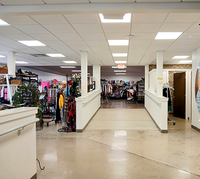 Step inside and the thrift store magic begins. Wide aisles, bright lighting, and organization that would make Marie Kondo weep with joy.