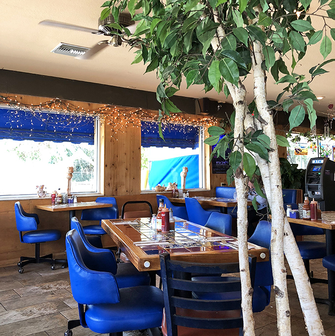 The bright, welcoming interior features comfortable booths and vibrant murals that celebrate Florida's spirit.