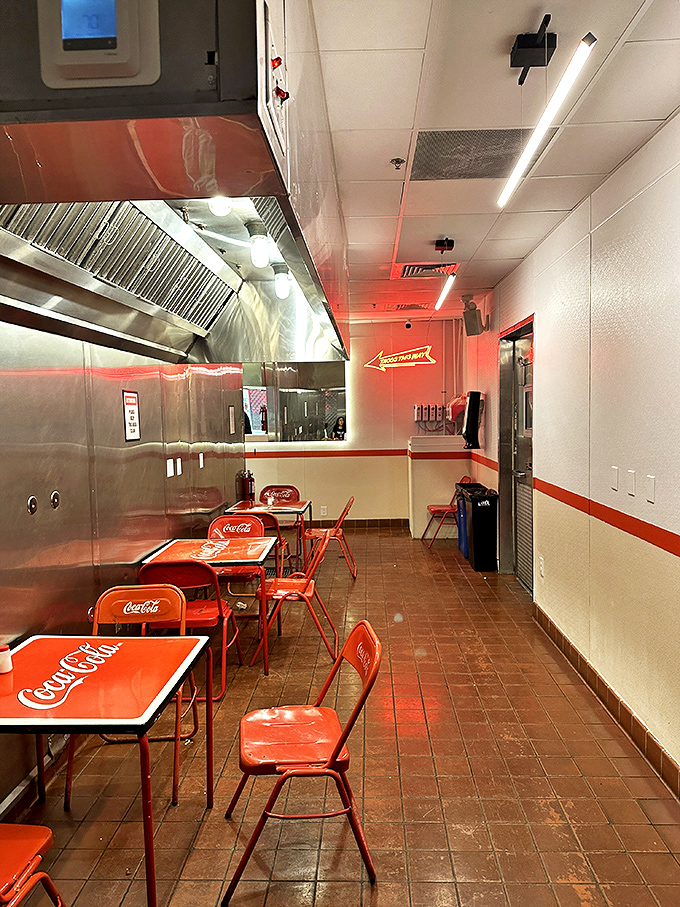 Inside, Coca-Cola branded tables and stainless steel simplicity create the perfect stage where tacos become the undisputed stars of the show.