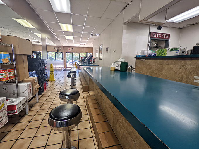 No-frills counter seating where culinary magic happens. This isn't dining theater&mdash;it's sandwich reality, where every stool tells a story.