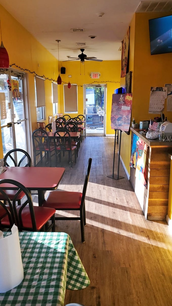 Sunshine-yellow walls create an unexpectedly cheerful backdrop for the serious business of barbecue consumption that happens within these humble walls.