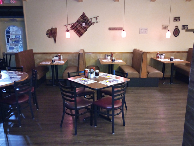 Cozy booths and warm lighting create that perfect diner atmosphere where conversations flow as easily as the coffee. Home away from home, indeed.