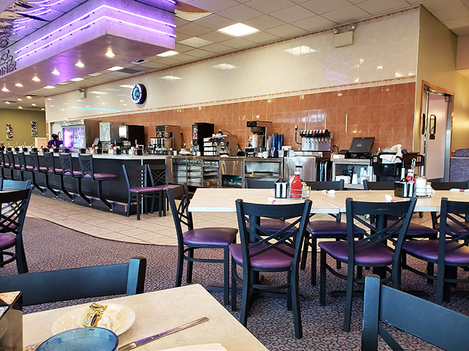 The spacious interior with its signature purple chairs offers that perfect blend of cleanliness and coziness&mdash;diner perfection without a hint of pretension.