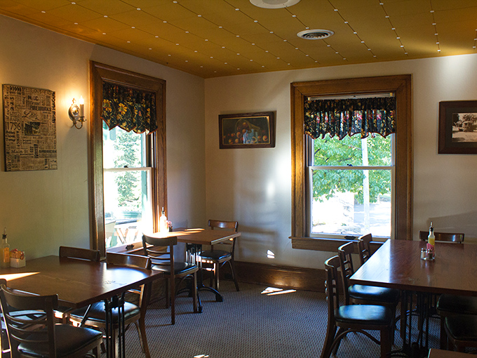 Warm wood tones and vintage-inspired lighting create the perfect backdrop for morning revelations over perfectly poached eggs and steaming coffee.