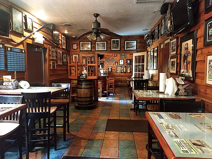 Rustic wooden charm meets burger hall of fame. The walls tell stories of epic eating challenges while the cozy interior invites you to create your own legendary meal.
