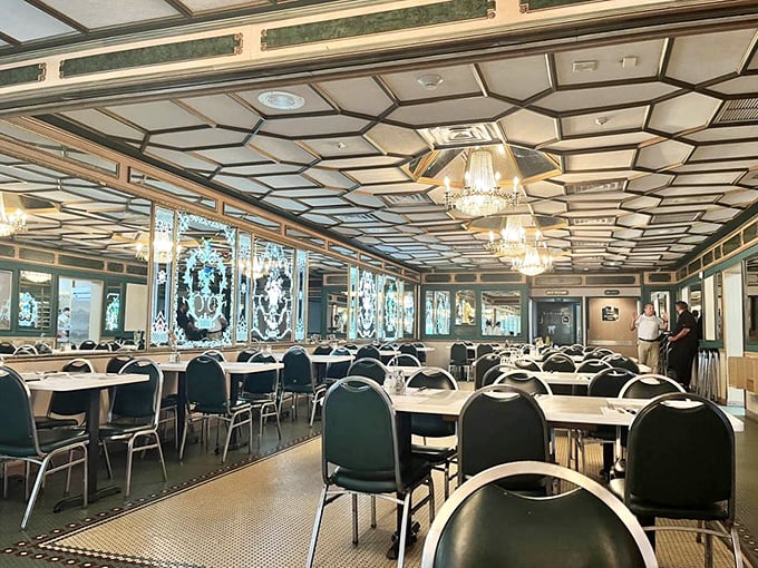 Those mirrors aren't just decor &ndash; they're multiplying your dining joy into infinity, chandelier glamour included.