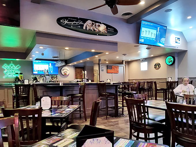 Inside O'Gillies, the warm wood tones and comfortable seating create that perfect "everybody knows your name" vibe without trying too hard.