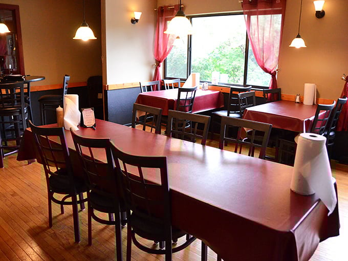 Simple elegance meets Midwest comfort in Frankie's dining room. Those burgundy tablecloths and warm wooden floors have witnessed countless satisfied sighs from happy diners.
