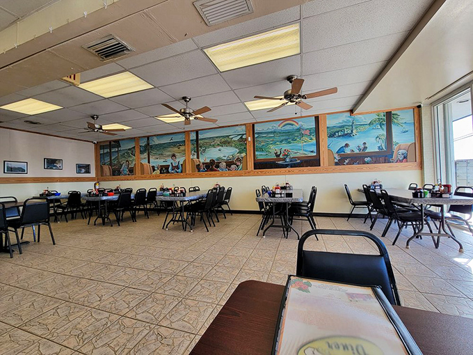 Simple tables, ceiling fans, and colorful murals of Keys life – Doc's interior feels like Florida before Instagram decided what it should look like.