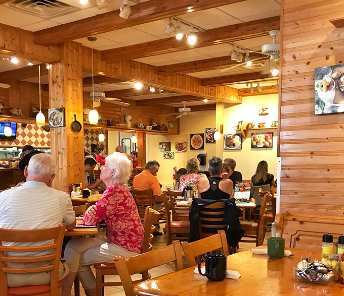Warm pine paneling and cozy wooden tables make you feel instantly at home. The kind of place where breakfast memories are made.